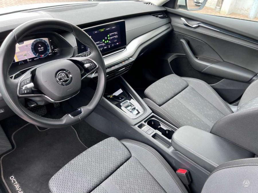 White Skoda Octavia 2023 in Vilnius, with an engine capacity of 1.50 L and mileage of 64 thousand km for 22990 €, photo 12 on AUTOMOTO.COM.LV