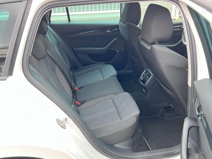 White Skoda Octavia 2023 in Vilnius, with an engine capacity of 1.50 L and mileage of 64 thousand km for 22990 €, photo 29 on AUTOMOTO.COM.LV
