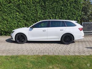 White Skoda Octavia 2023 in Kalvarija, with an engine capacity of 1.50 L and mileage of 135 thousand km for 16396 €, photo 3 on AUTOMOTO.COM.LV