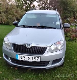 Grey Skoda Praktik 2015 in Riga, with an engine capacity of 1.20 L and mileage of 169 thousand km for 3535 €, photo  on AUTOMOTO.COM.LV