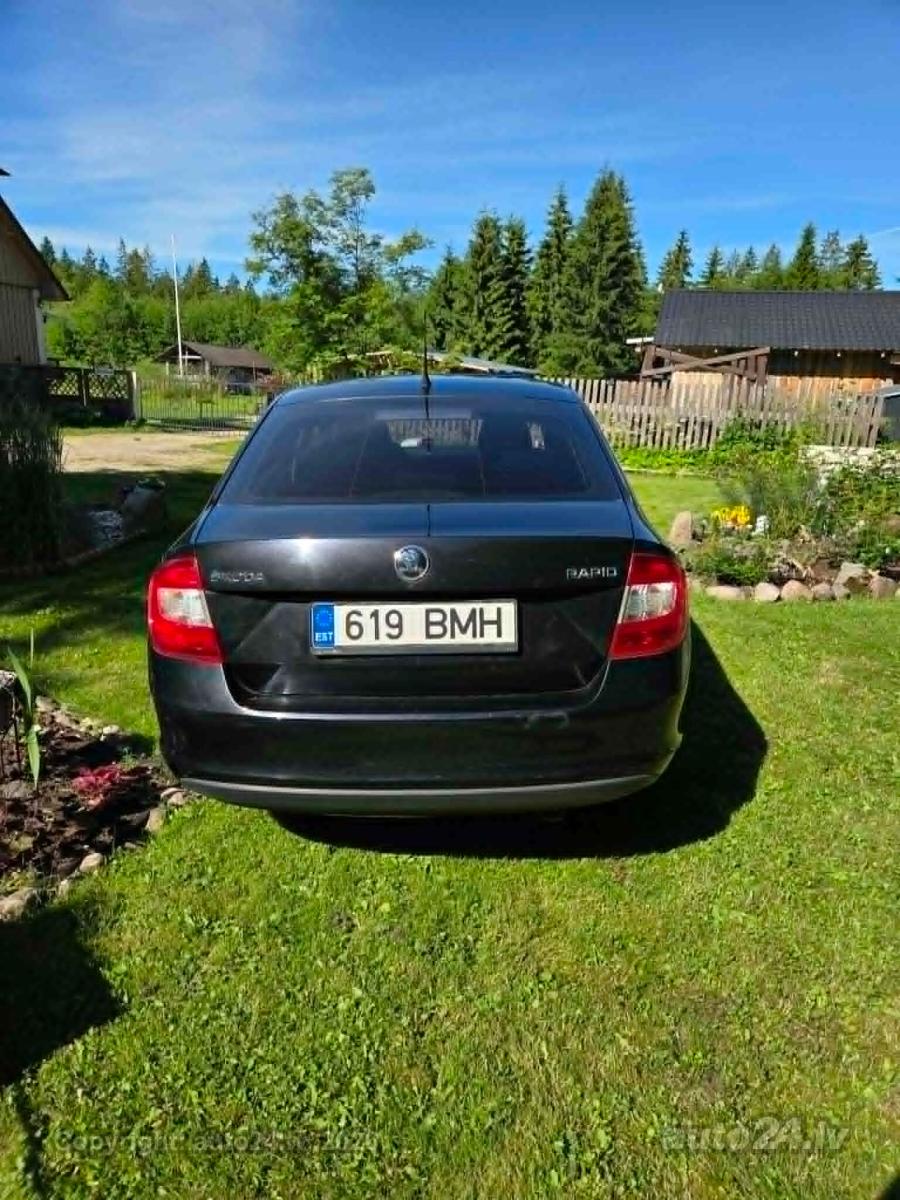 Black Skoda Rapid 2014 in Tallinn, with an engine capacity of 1.20 L and mileage of 119 thousand km for 4490 €, photo 4 on AUTOMOTO.COM.LV