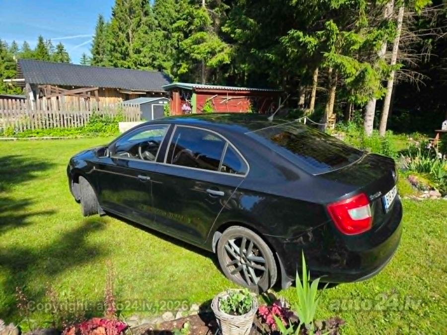 Black Skoda Rapid 2014 in Tallinn, with an engine capacity of 1.20 L and mileage of 119 thousand km for 4490 €, photo 6 on AUTOMOTO.COM.LV