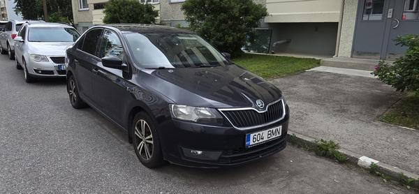 Black Skoda Rapid 2014 in Tallinn, with an engine capacity of 1.20 L and mileage of 336 thousand km for 2439 €, photo 1 on AUTOMOTO.COM.LV