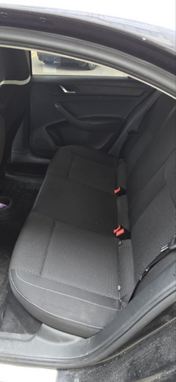 Black Skoda Rapid 2014 in Tallinn, with an engine capacity of 1.20 L and mileage of 336 thousand km for 2439 €, photo 5 on AUTOMOTO.COM.LV