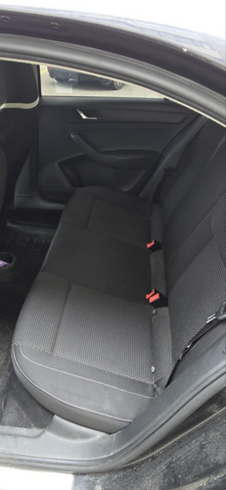 Black Skoda Rapid 2014 in Tallinn, with an engine capacity of 1.20 L and mileage of 336 thousand km for 2439 €, photo 6 on AUTOMOTO.COM.LV