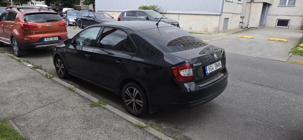Black Skoda Rapid 2014 in Tallinn, with an engine capacity of 1.20 L and mileage of 336 thousand km for 2439 €, photo 9 on AUTOMOTO.COM.LV