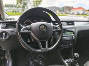 Black Skoda Rapid 2014 in Siauliai, with an engine capacity of 1.60 L and mileage of 299 thousand km for 4200 €, photo 13 on AUTOMOTO.COM.LV