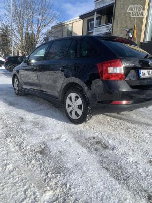 Black Skoda Rapid 2016 in Siauliai, with an engine capacity of 1.40 L and mileage of 275 thousand km for 4700 €, photo 2 on AUTOMOTO.COM.LV