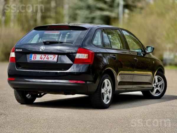 Black Skoda Rapid 2016 in Riga, with an engine capacity of 1.20 L and mileage of 190 thousand km for 5790 €, photo 5 on AUTOMOTO.COM.LV