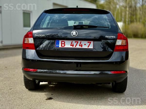 Black Skoda Rapid 2016 in Riga, with an engine capacity of 1.20 L and mileage of 190 thousand km for 5790 €, photo 7 on AUTOMOTO.COM.LV