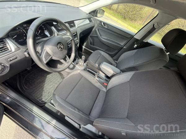 Black Skoda Rapid 2016 in Riga, with an engine capacity of 1.20 L and mileage of 190 thousand km for 4970 €, photo 9 on AUTOMOTO.COM.LV