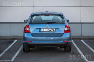 Blue Skoda Rapid 2015 in Riga, with an engine capacity of 1.40 L and mileage of 264 thousand km for 6490 €, photo 6 on AUTOMOTO.COM.LV