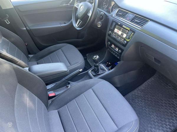 Blue Skoda Rapid 2015 in Birzai, with an engine capacity of 1.60 L and mileage of 147 thousand km for 4990 €, photo 5 on AUTOMOTO.COM.LV