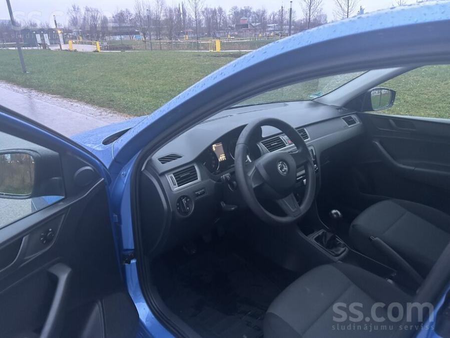 Blue Skoda Rapid 2015 in Riga, with an engine capacity of 1.40 L and mileage of 262 thousand km for 4300 €, photo 4 on AUTOMOTO.COM.LV