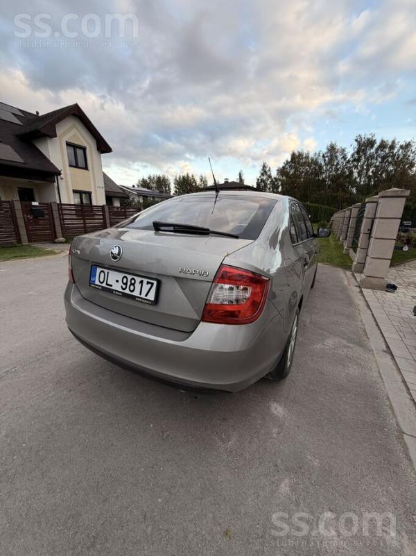 Brown Skoda Rapid 2013 in Riga, with an engine capacity of 1.20 L and mileage of 104 thousand km for 3900 €, photo 4 on AUTOMOTO.COM.LV
