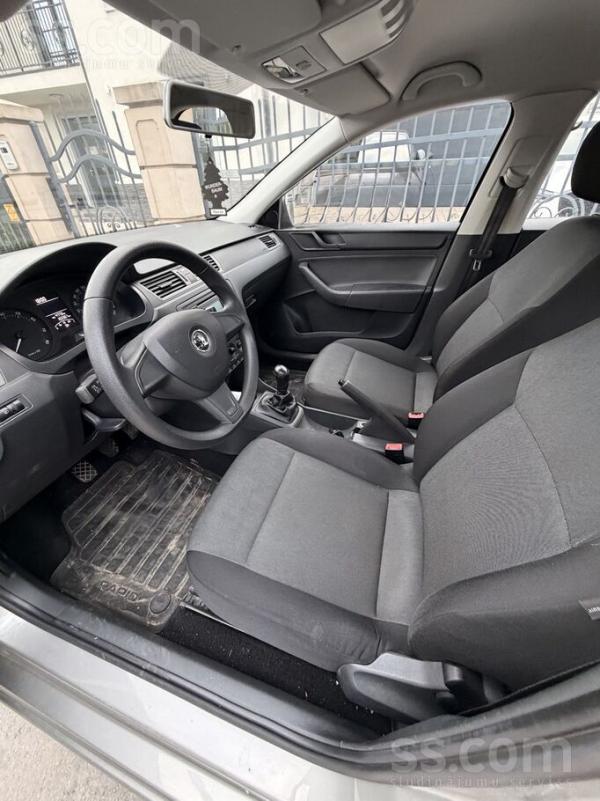 Brown Skoda Rapid 2013 in Riga, with an engine capacity of 1.20 L and mileage of 104 thousand km for 3900 €, photo 6 on AUTOMOTO.COM.LV