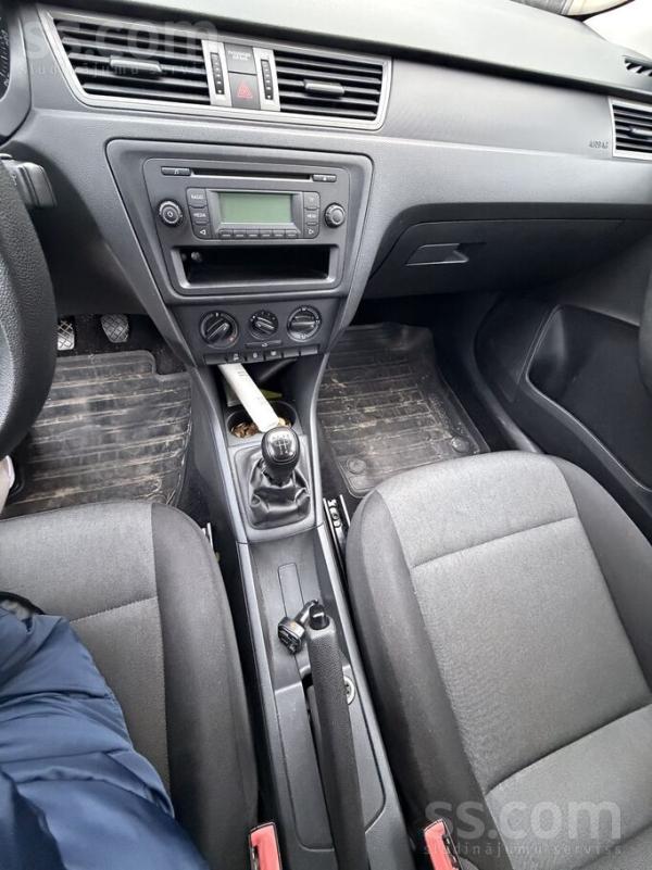Brown Skoda Rapid 2013 in Riga, with an engine capacity of 1.20 L and mileage of 104 thousand km for 3900 €, photo 8 on AUTOMOTO.COM.LV