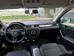 Grey Skoda Rapid 2014 in Kaunas, with an engine capacity of 1.60 L and mileage of 358 thousand km for 4700 €, photo 9 on AUTOMOTO.COM.LV