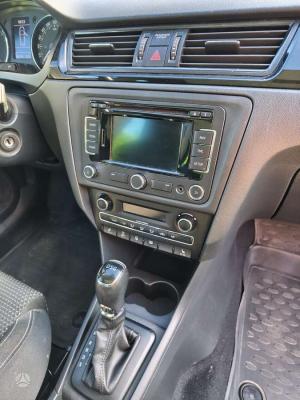 Grey Skoda Rapid 2014 in Vilnius, with an engine capacity of 1.60 L and mileage of 202 thousand km for 5500 €, photo 3 on AUTOMOTO.COM.LV