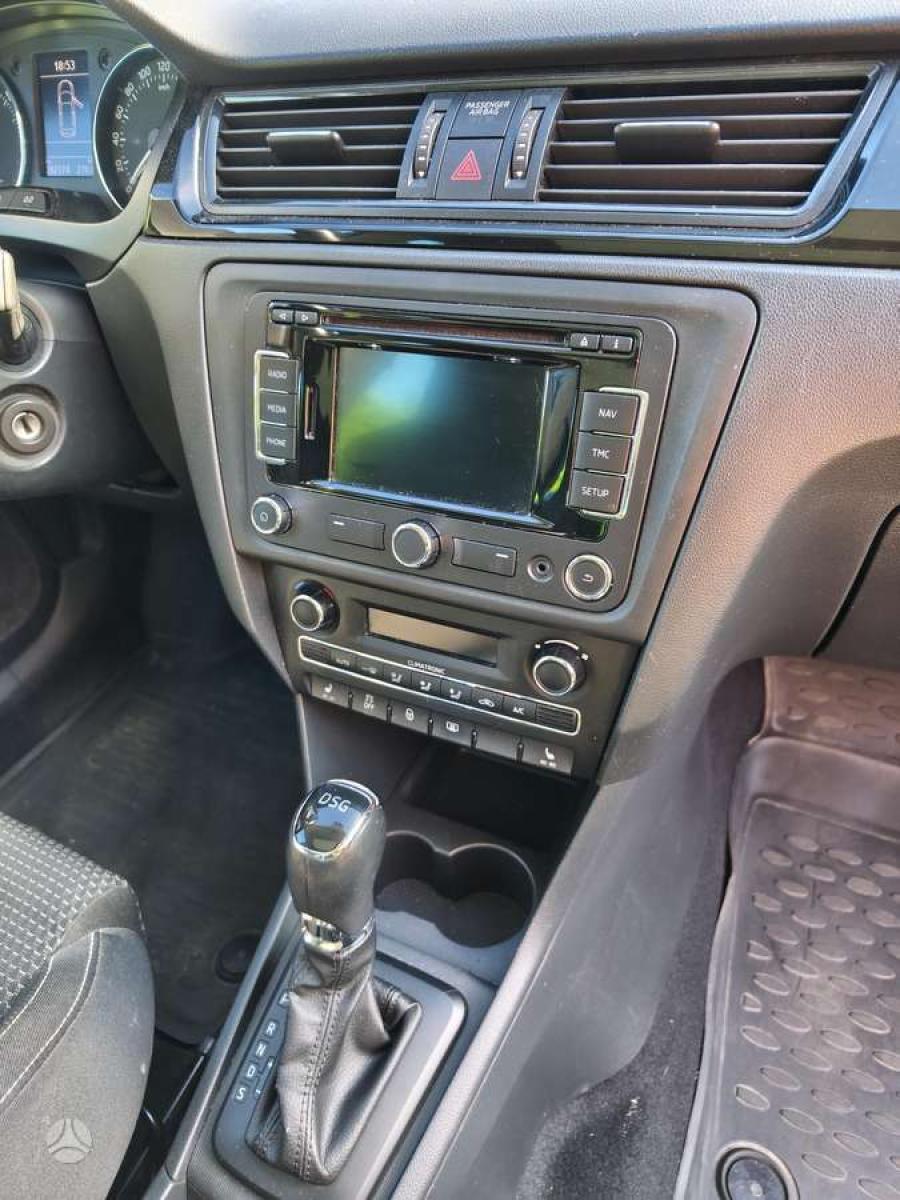 Grey Skoda Rapid 2014 in Vilnius, with an engine capacity of 1.60 L and mileage of 202 thousand km for 5500 €, photo 3 on AUTOMOTO.COM.LV