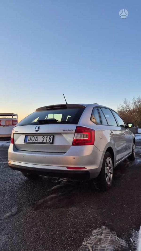 Grey Skoda Rapid 2017 in Vilnius, with an engine capacity of 1.60 L and mileage of 88 thousand km for 7300 €, photo 6 on AUTOMOTO.COM.LV