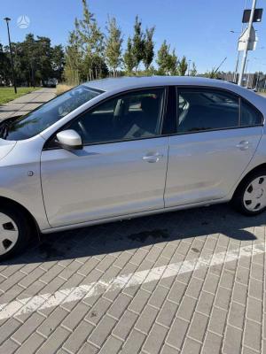 Pelēks Skoda Rapid 2015 Viļņa, ar dzinēja tilpumu 1.20 L un nobraukumu 191 tūkst. km par 4400 €, foto 6 vietnē AUTOMOTO.COM.LV