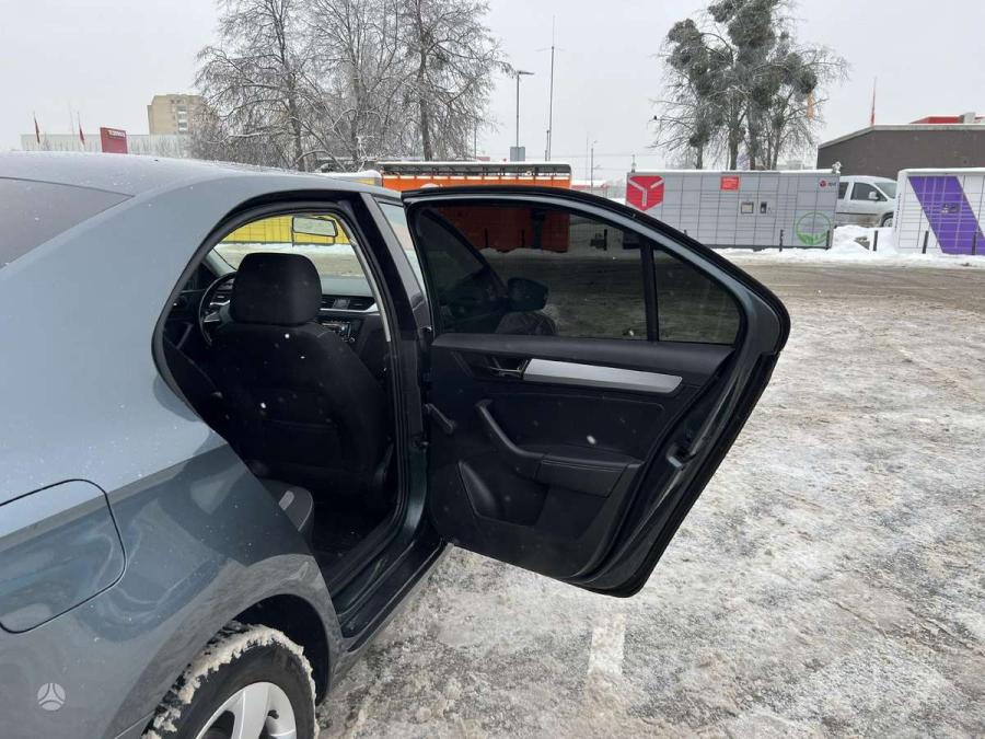 Grey Skoda Rapid 2017 in Kaunas, with an engine capacity of 1.60 L and mileage of 244 thousand km for 6300 €, photo 14 on AUTOMOTO.COM.LV