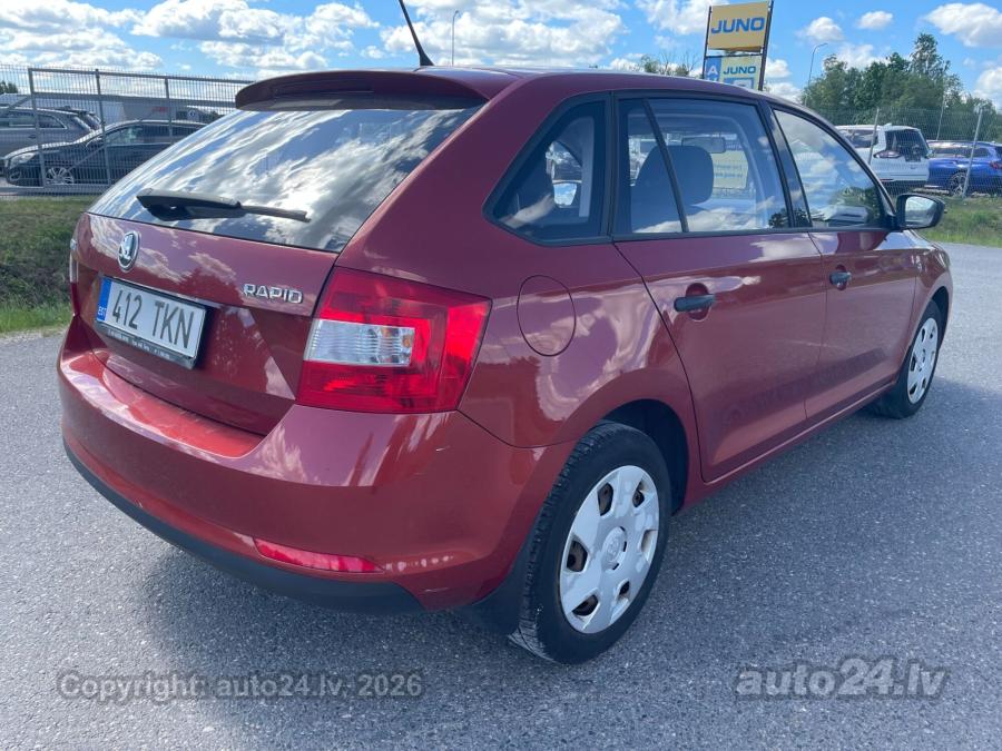 Red Skoda Rapid 2013 in Tartu, with an engine capacity of 1.20 L and mileage of 137 thousand km for 2990 €, photo 6 on AUTOMOTO.COM.LV