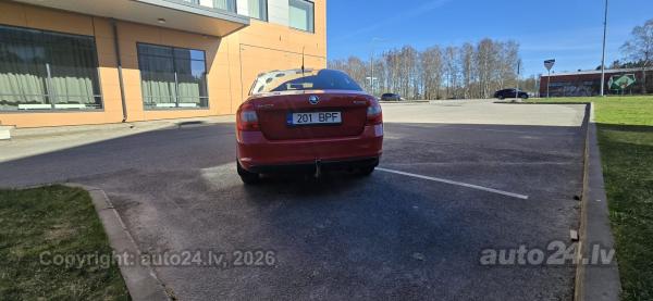 Red Skoda Rapid 2015 in Tallinn, with an engine capacity of 1.20 L and mileage of 88 thousand km for 5700 €, photo 8 on AUTOMOTO.COM.LV