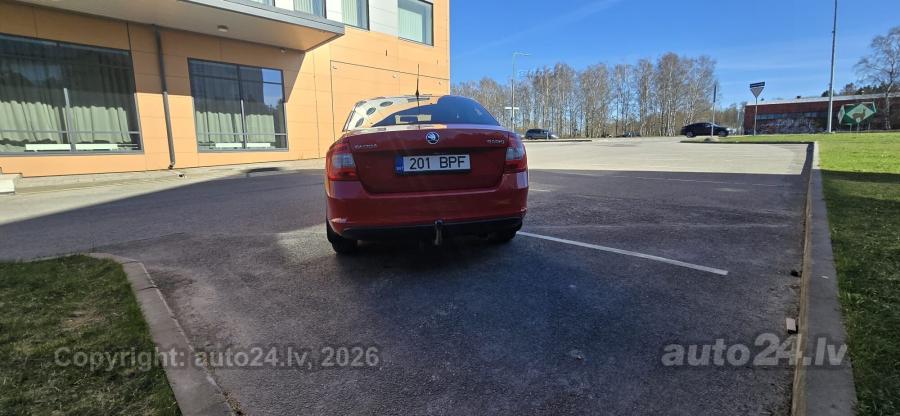 Red Skoda Rapid 2015 in Tallinn, with an engine capacity of 1.20 L and mileage of 88 thousand km for 5700 €, photo 9 on AUTOMOTO.COM.LV