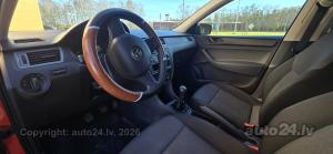 Red Skoda Rapid 2015 in Tallinn, with an engine capacity of 1.20 L and mileage of 88 thousand km for 5700 €, photo 12 on AUTOMOTO.COM.LV