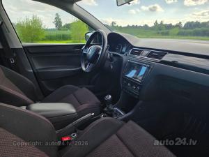 Red Skoda Rapid 2015 in Tallinn, with an engine capacity of 1.20 L and mileage of 150 thousand km for 5999 €, photo 5 on AUTOMOTO.COM.LV