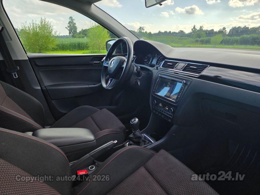 Red Skoda Rapid 2015 in Tallinn, with an engine capacity of 1.20 L and mileage of 150 thousand km for 5999 €, photo 5 on AUTOMOTO.COM.LV