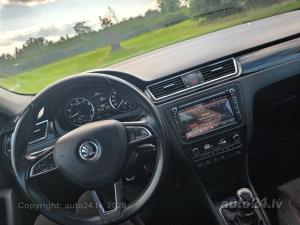 Red Skoda Rapid 2015 in Tallinn, with an engine capacity of 1.20 L and mileage of 150 thousand km for 5999 €, photo 8 on AUTOMOTO.COM.LV