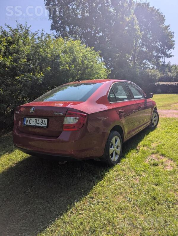 Red Skoda Rapid 2015 in Riga, with an engine capacity of 1.60 L and mileage of 138 thousand km for 5500 €, photo 3 on AUTOMOTO.COM.LV