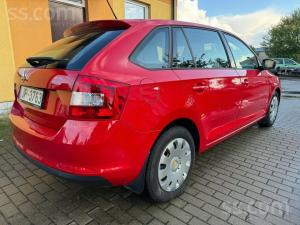 Red Skoda Rapid 2014 in Balvi, with an engine capacity of 1.60 L and mileage of 318 thousand km for 2750 €, photo 3 on AUTOMOTO.COM.LV