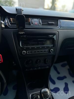 Red Skoda Rapid 2014 in Balvi, with an engine capacity of 1.60 L and mileage of 318 thousand km for 2750 €, photo 11 on AUTOMOTO.COM.LV