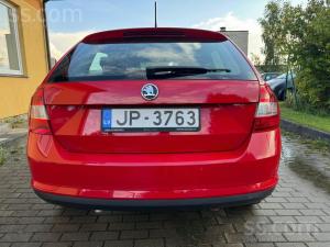 Red Skoda Rapid 2014 in Balvi, with an engine capacity of 1.60 L and mileage of 318 thousand km for 2750 €, photo 15 on AUTOMOTO.COM.LV