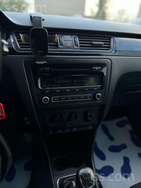 Red Skoda Rapid 2014 in Balvi, with an engine capacity of 1.60 L and mileage of 318 thousand km for 2750 €, photo 11 on AUTOMOTO.COM.LV