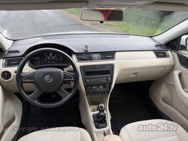 White Skoda Rapid 2013 in Tallinn, with an engine capacity of 1.20 L and mileage of 192 thousand km for 3899 €, photo 6 on AUTOMOTO.COM.LV
