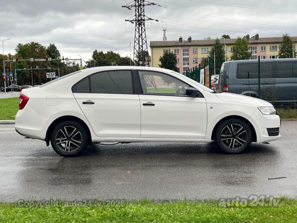 White Skoda Rapid 2013 in Narva, with an engine capacity of 1.60 L and mileage of 390 thousand km for 2499 €, photo 5 on AUTOMOTO.COM.LV