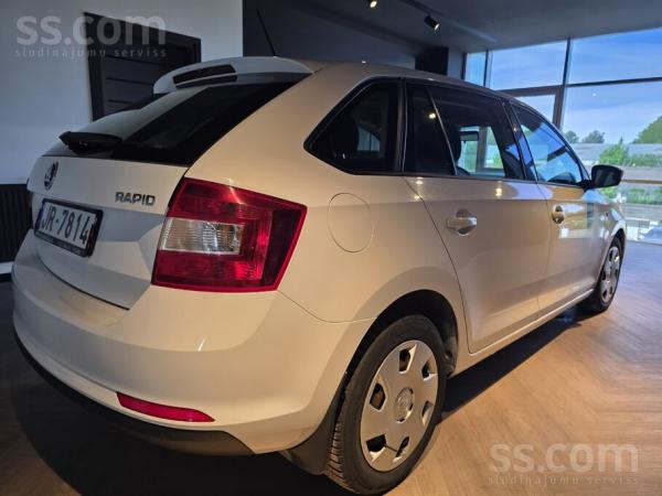 White Skoda Rapid 2014 in Riga, with an engine capacity of 1.60 L and mileage of 214 thousand km for 3600 €, photo 4 on AUTOMOTO.COM.LV