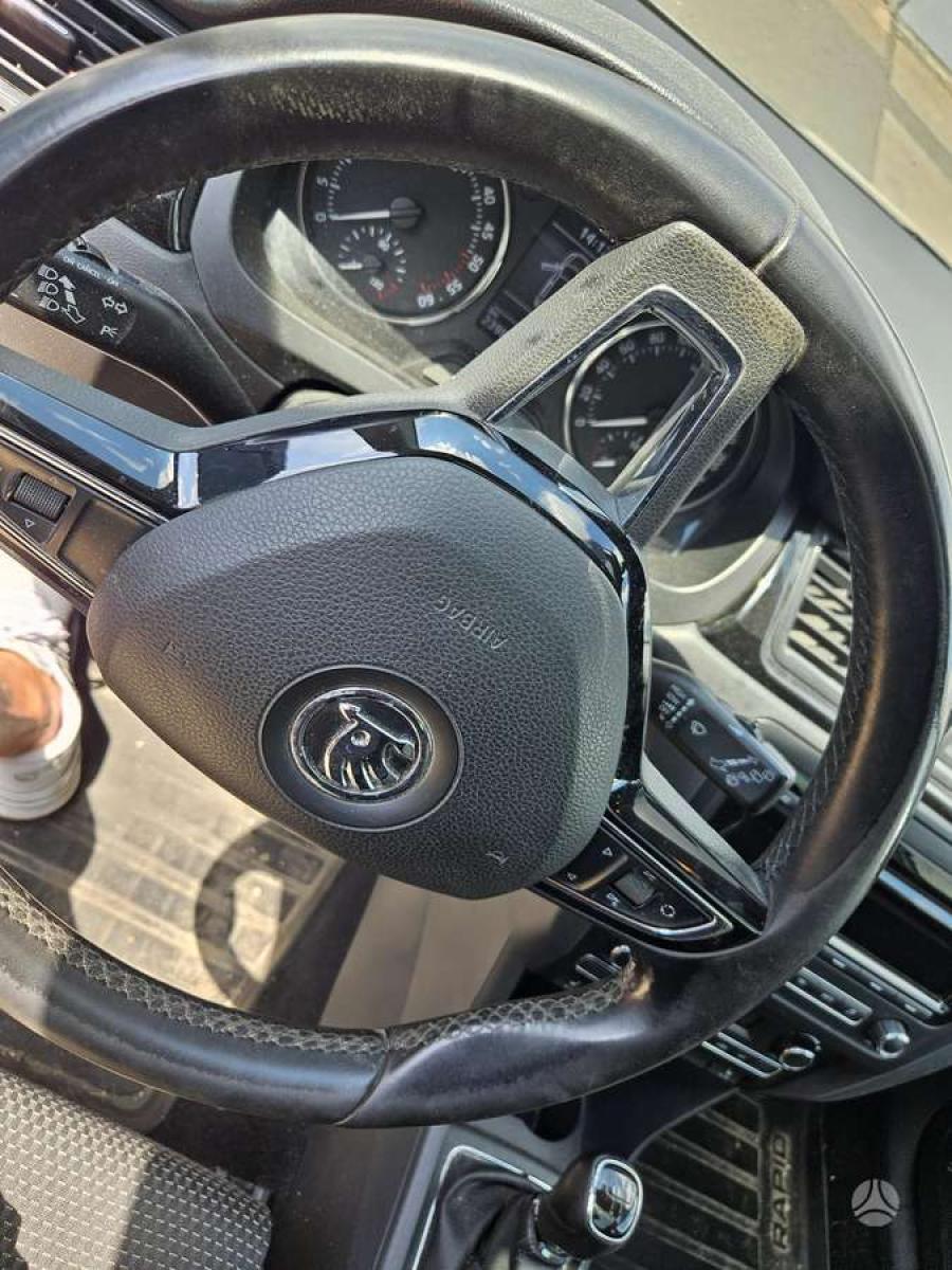 White Skoda Rapid 2014 in Utena, with an engine capacity of 1.60 L and mileage of 238 thousand km for 2799 €, photo 7 on AUTOMOTO.COM.LV