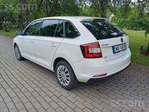 White Skoda Rapid 2019 in Riga, with an engine capacity of 1.00 L and mileage of 239 thousand km for 4990 €, photo 4 on AUTOMOTO.COM.LV