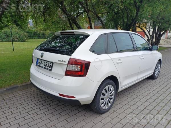 White Skoda Rapid 2019 in Riga, with an engine capacity of 1.00 L and mileage of 239 thousand km for 4990 €, photo 4 on AUTOMOTO.COM.LV