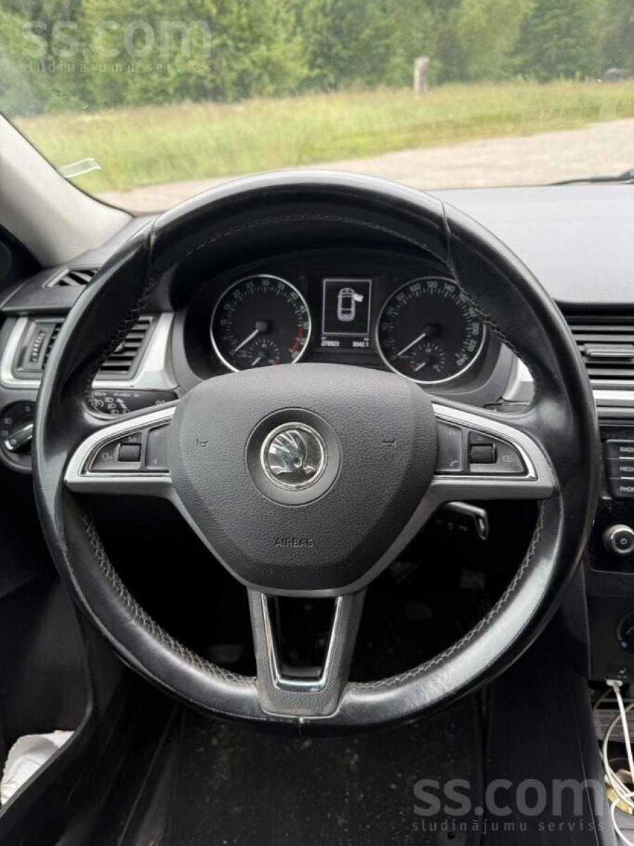 White Skoda Rapid 2015 in Riga, with an engine capacity of 1.60 L and mileage of 271 thousand km for 3250 €, photo 6 on AUTOMOTO.COM.LV