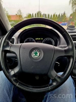 Melns Skoda Roomster 2008 Jelgava, ar dzinēja tilpumu 1.90 L un nobraukumu 287 tūkst. km par 3650 €, foto 23 vietnē AUTOMOTO.COM.LV