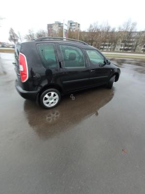 Black Skoda Roomster 2007 in Panevezys, with an engine capacity of 1.40 L and mileage of 140 thousand km for 1200 €, photo 12 on AUTOMOTO.COM.LV
