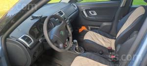 Zils Skoda Roomster 2008 Rīga, ar dzinēja tilpumu 1.60 L un nobraukumu 175 tūkst. km par 3300 €, foto 5 vietnē AUTOMOTO.COM.LV