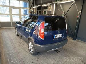 Blue Skoda Roomster 2012 in Jurmala, with an engine capacity of 1.60 L and mileage of 234 thousand km for 2850 €, photo 4 on AUTOMOTO.COM.LV